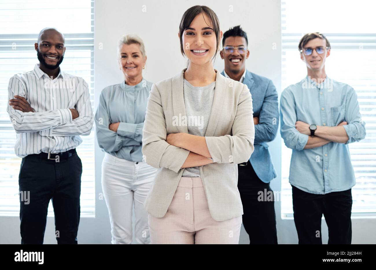 Taking charge of our own success. Portrait of a group of confident ...