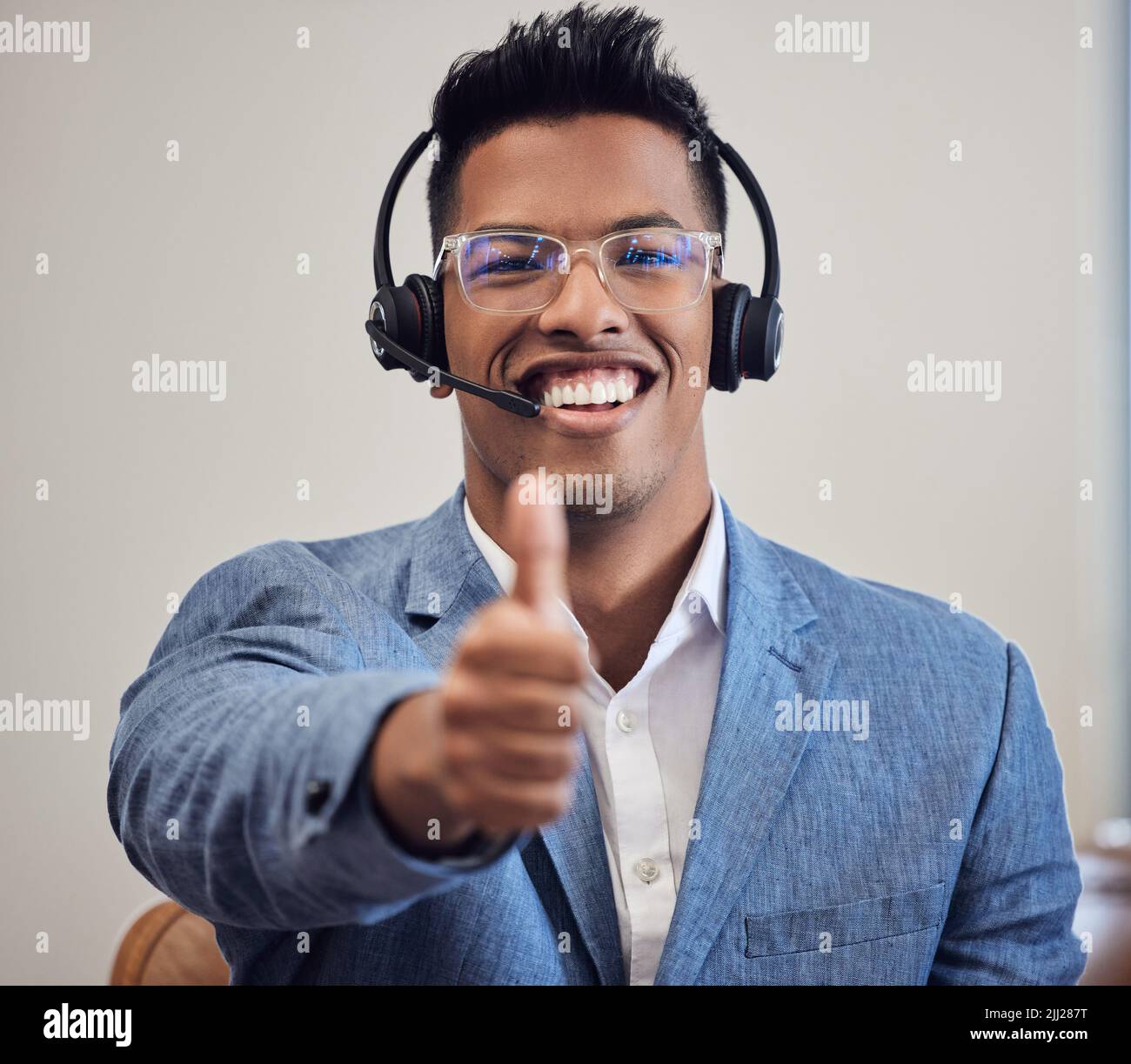 Call center office thumbs hi-res stock photography and images - Alamy