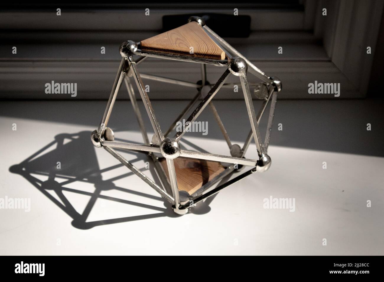 A closeup of a metal constructor on a windowsill Stock Photo - Alamy