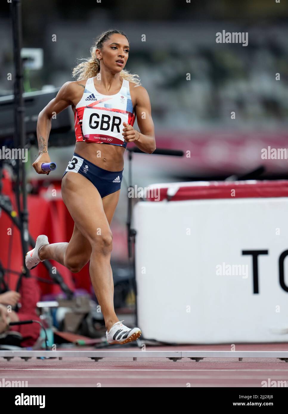 Laviai Nielsen participating in the 4x400 meter relay at the 2020 Tokyo ...