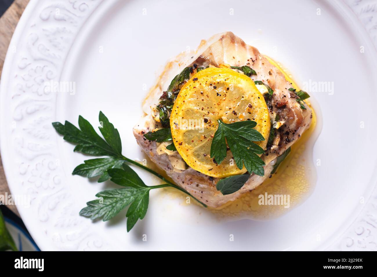 Healthy Food concept Homemade Lemon garlic butter Baked Cod fish on ...