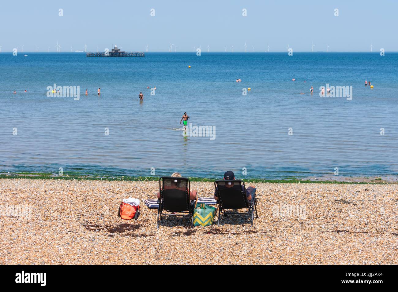 Herne Bay, Kent, UK: Beachgoers bask in the hot sunshine during the ...