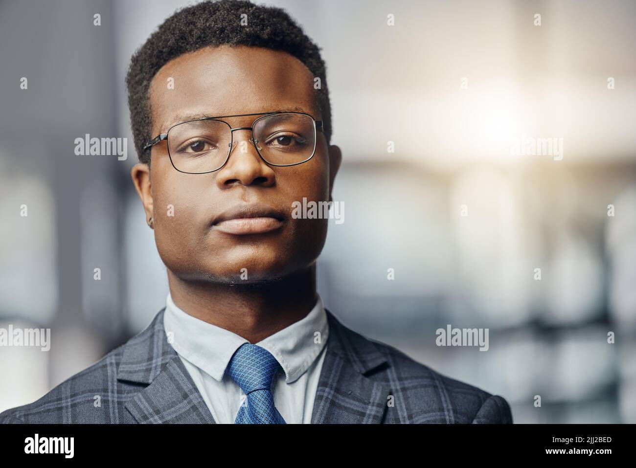 The face of the future of law. a young male lawyer at work Stock Photo ...