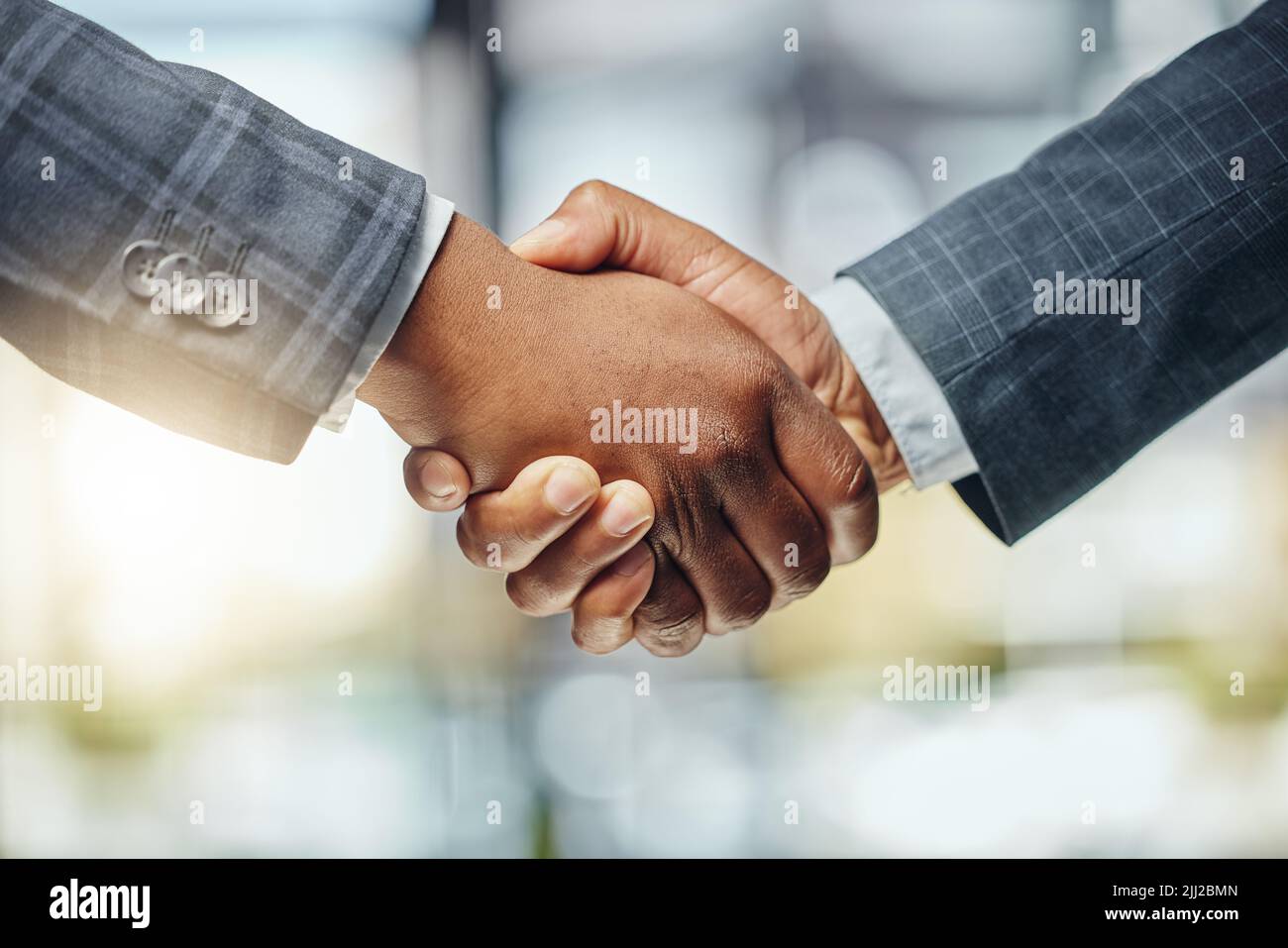 Shake my hand. two unrecognizable lawyers shaking hands at work Stock ...