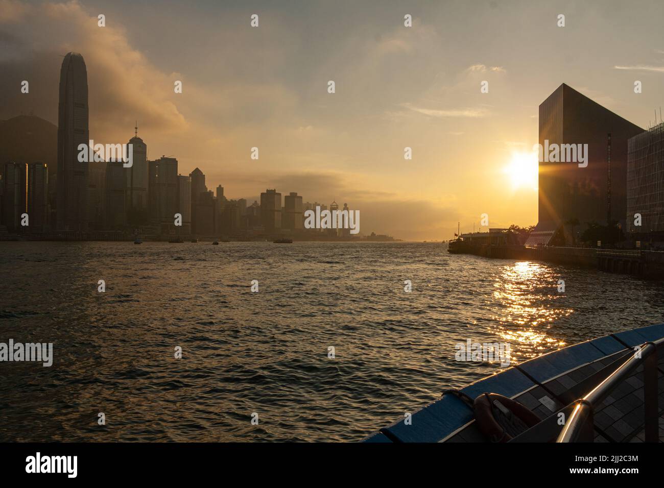 Victoria Harbour, Hong Kong at sunset Stock Photo - Alamy
