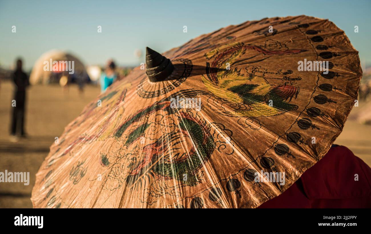 A selective of a traditional African umbrella Stock Photo - Alamy