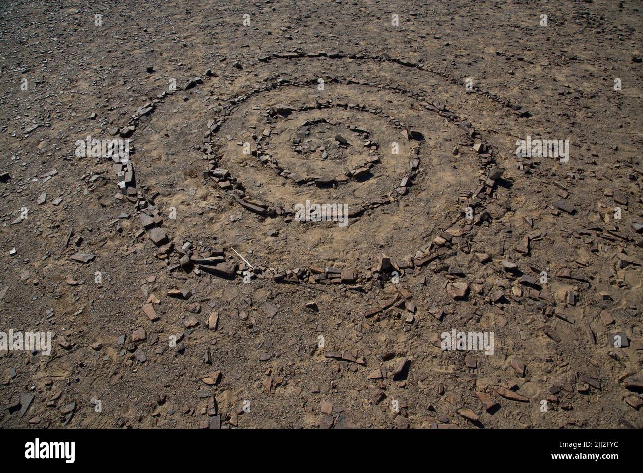 A spiral stone line on the ground for an African festival Stock Photo ...