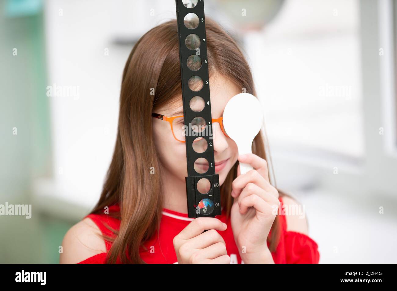 A little girl with visual impairment is being treated Stock Photo - Alamy
