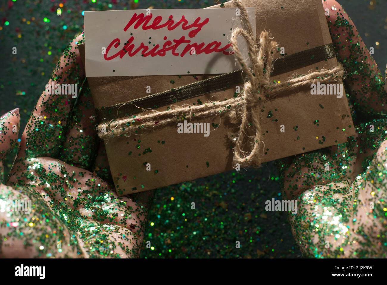 Festive backdrop of Christmas present Stock Photo - Alamy