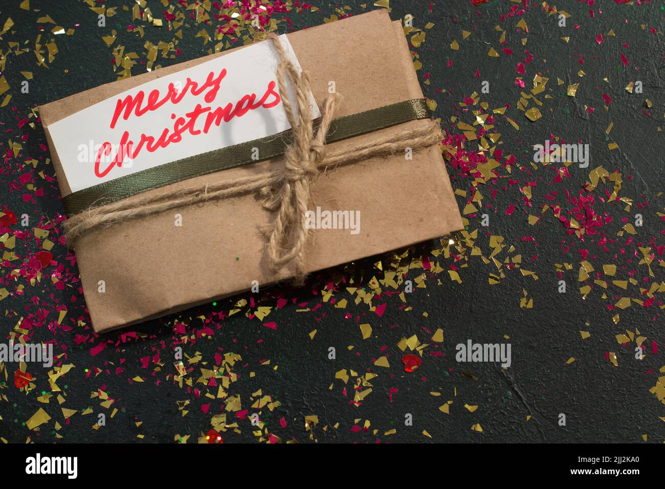 Festive backdrop of Christmas present Stock Photo - Alamy