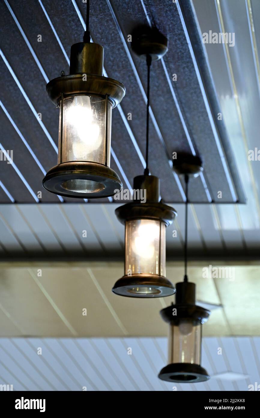 closeup the pair of dark brown lighting bulb lamp hanging on the floor ...