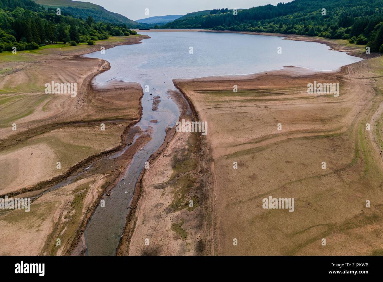 Aerial view of extremely low water levels at a reservoir during a ...