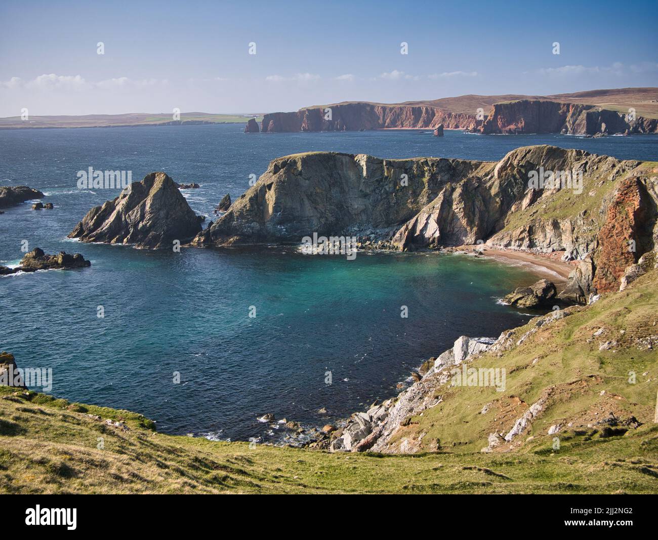 Dramatic coastal cliff scenery and a remote inaccessible beach on the ...