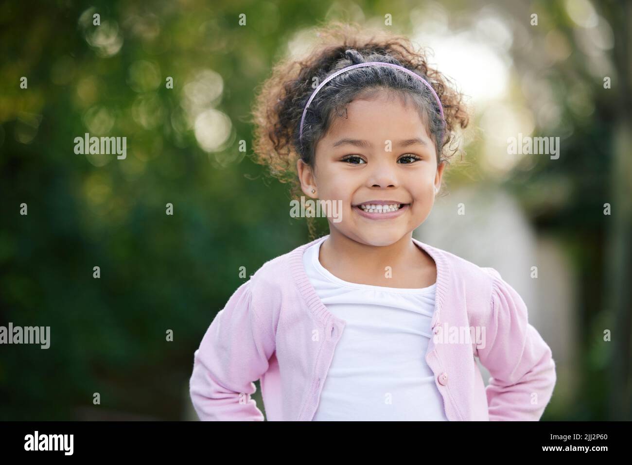 Childhood is a short season. Portrait of an adorable little girl having ...