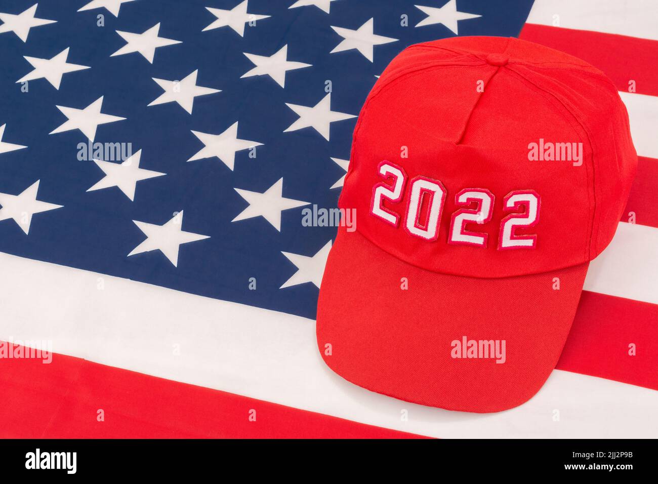 Red MAGA-type cap with 2022 date and US Stars and Stripes flag. For ...