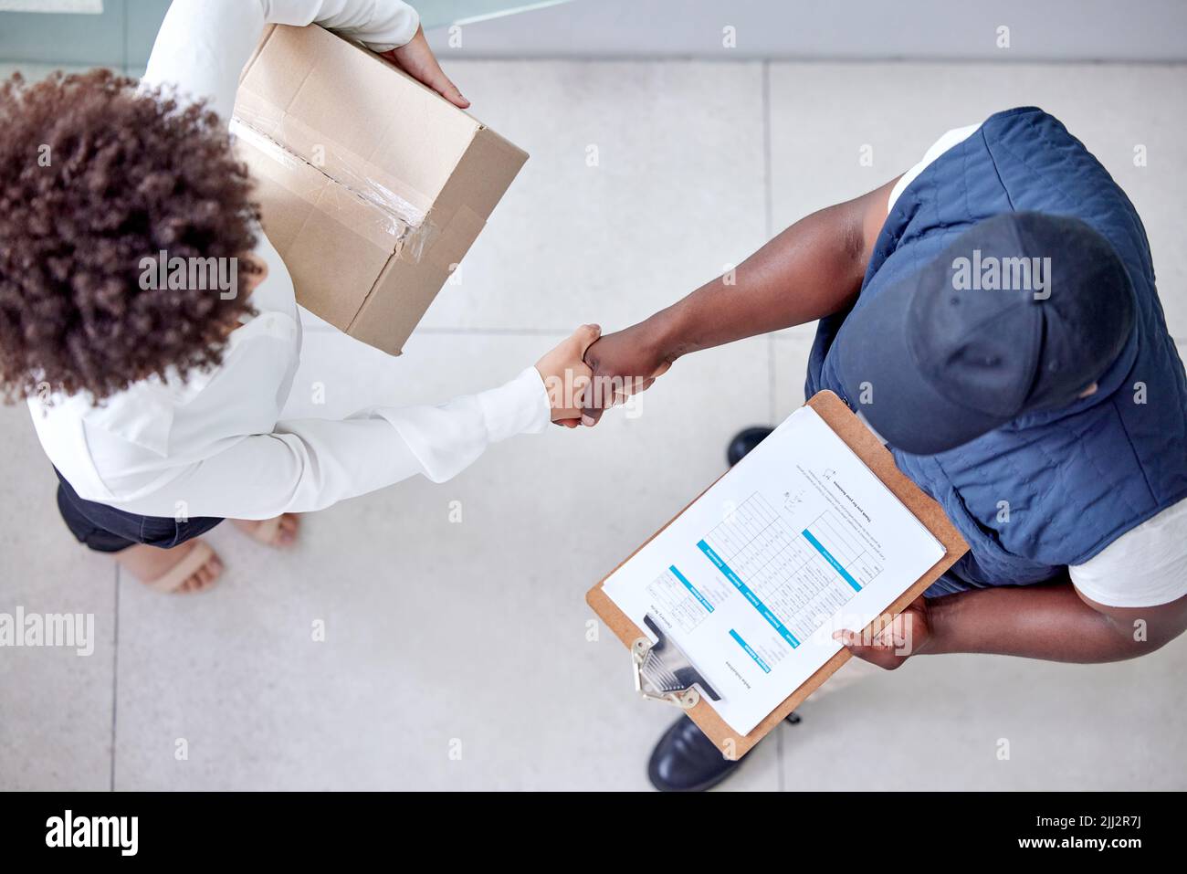 Because we all love convenience. a woman shaking hands with the ...