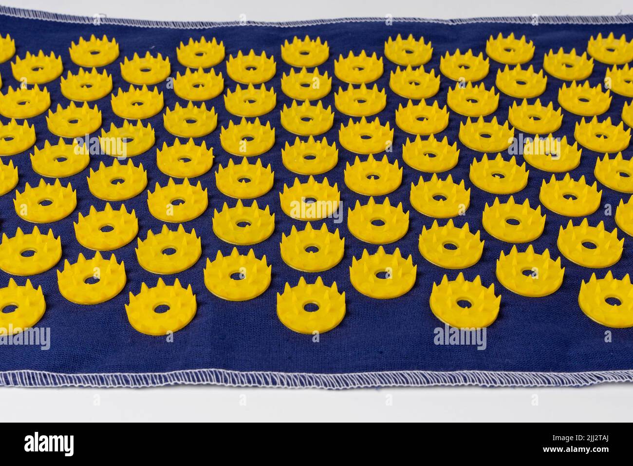 Acupuncture mat to maintain the health of the body. self-care at home ...