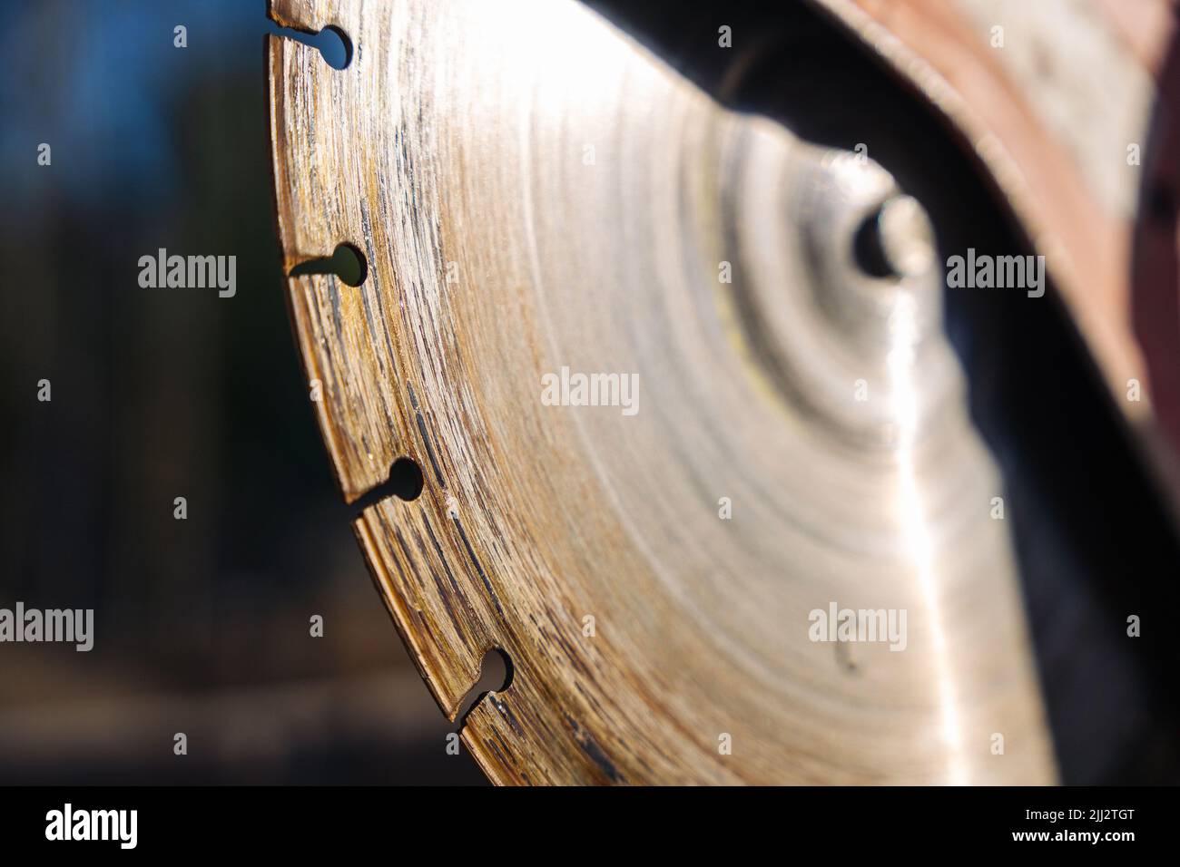 close-up of a saw with a disc for cutting concrete and paving slabs ...