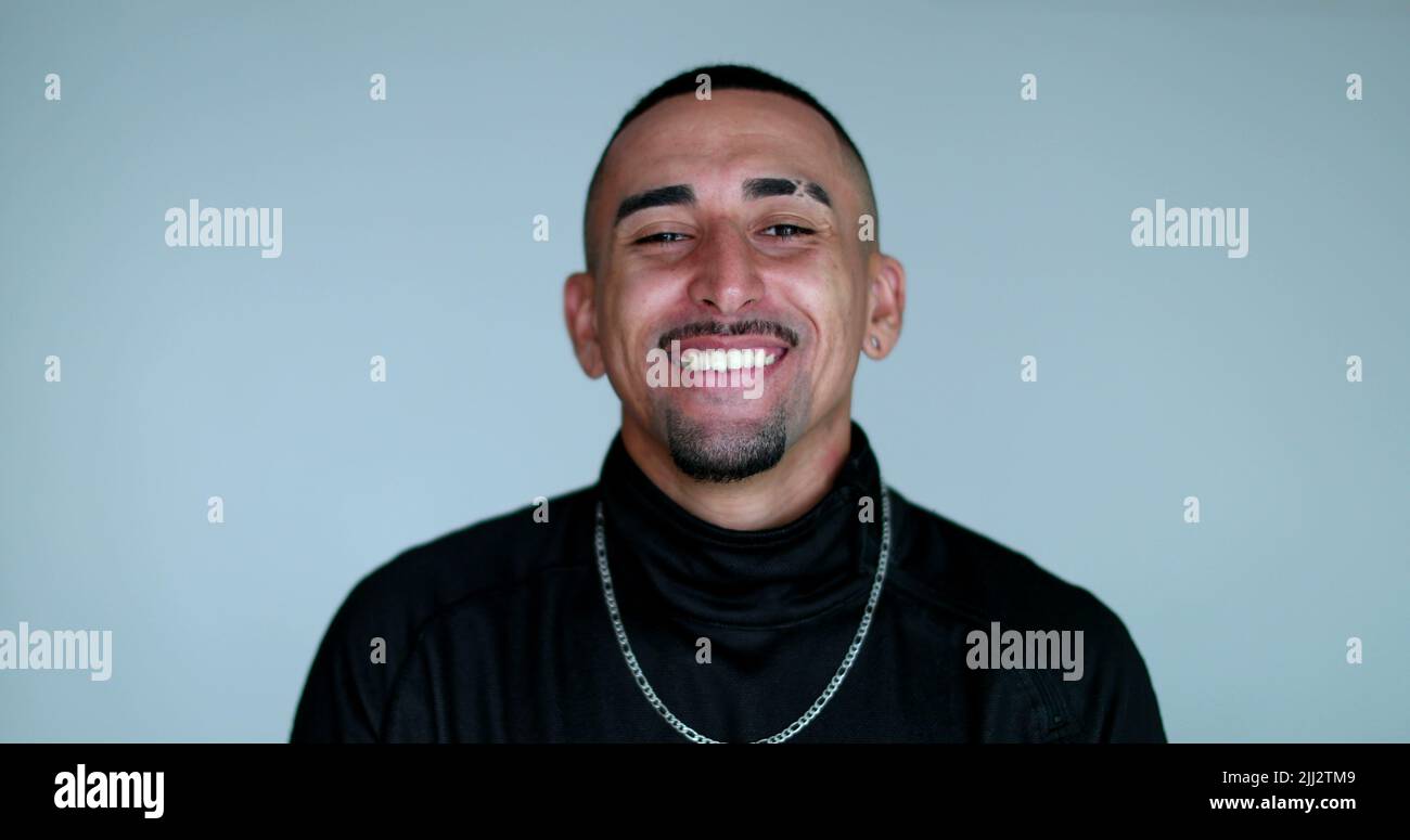 Portrait happy hispanic south american man smiling Stock Photo - Alamy