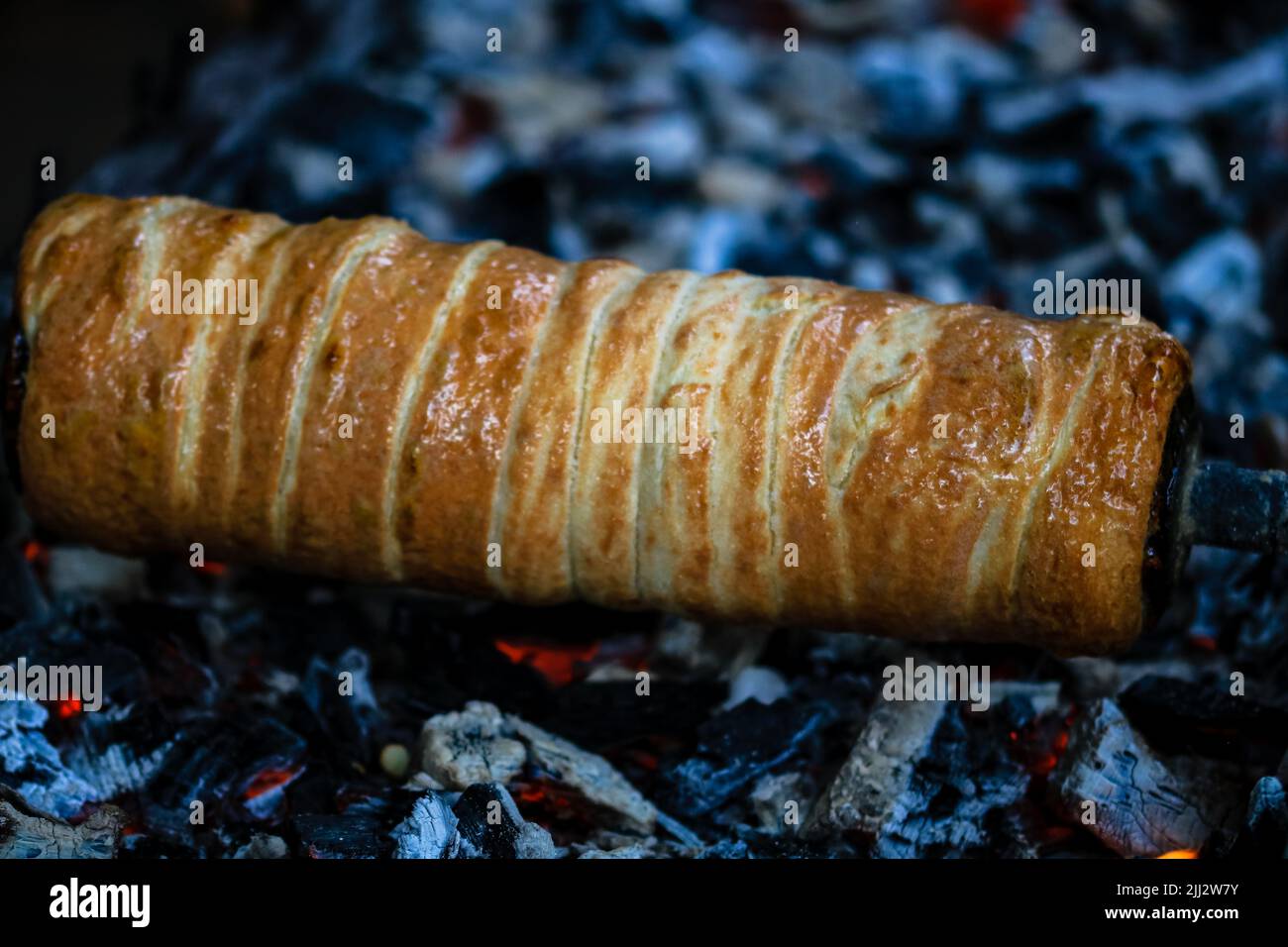 Kurtos Kolacs (Kürtőskalács). Traditional Hungarian cake, baked with ...