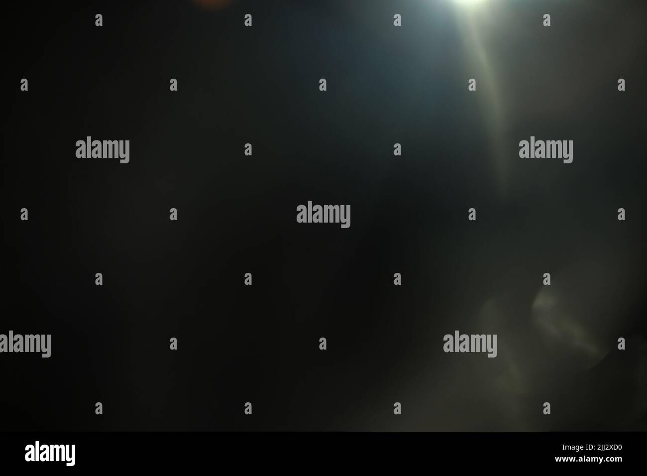 Real Lens Flare Shot on Black Background Stock Photo - Alamy