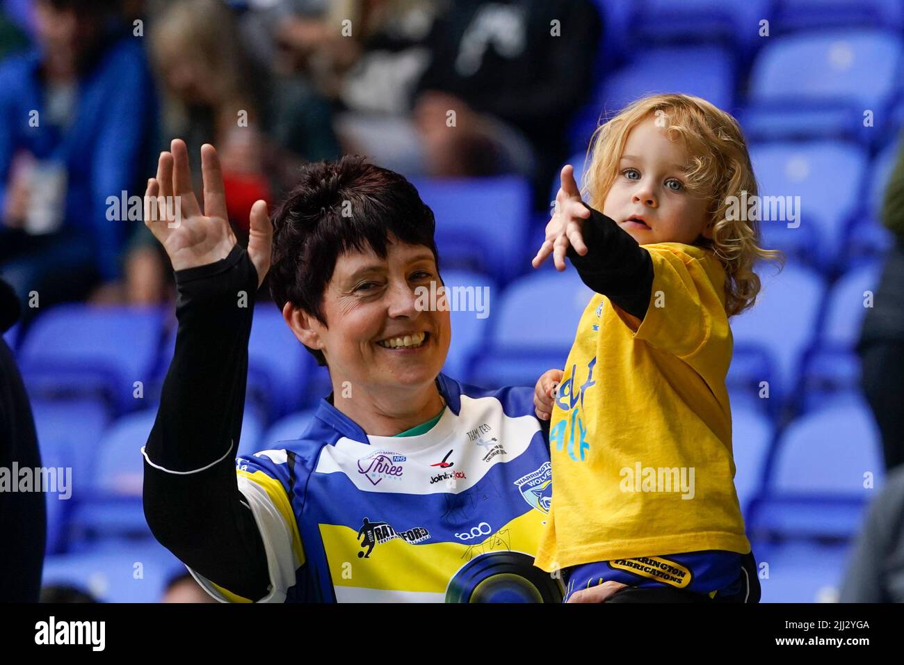 Warrington Wolves fans celebrate Wires first try Stock Photo - Alamy