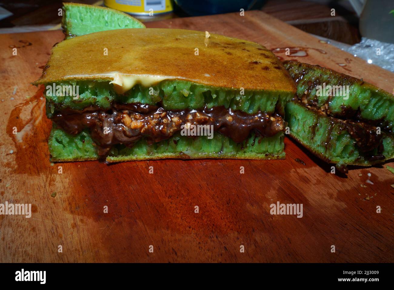Big pancake called martabak or terang bulan, Indonesian traditional ...
