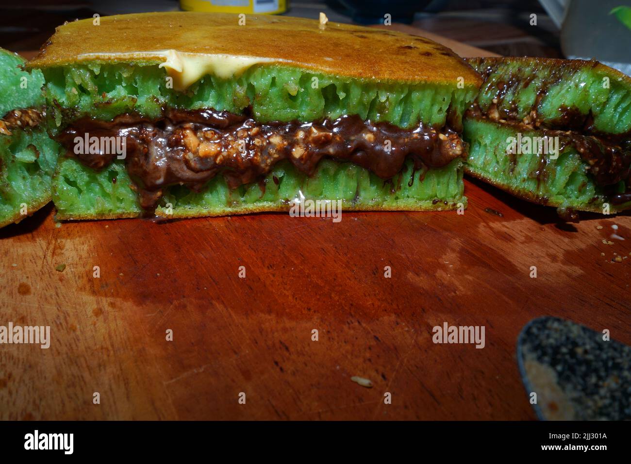 Big pancake called martabak or terang bulan, Indonesian traditional ...