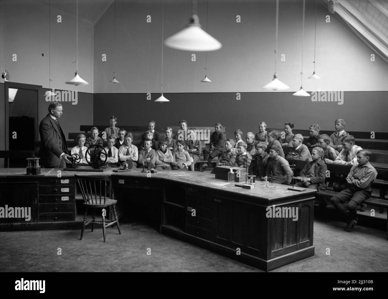 Vasaskolan, interior of the Physics Hall.31 School boys with teachers E ...