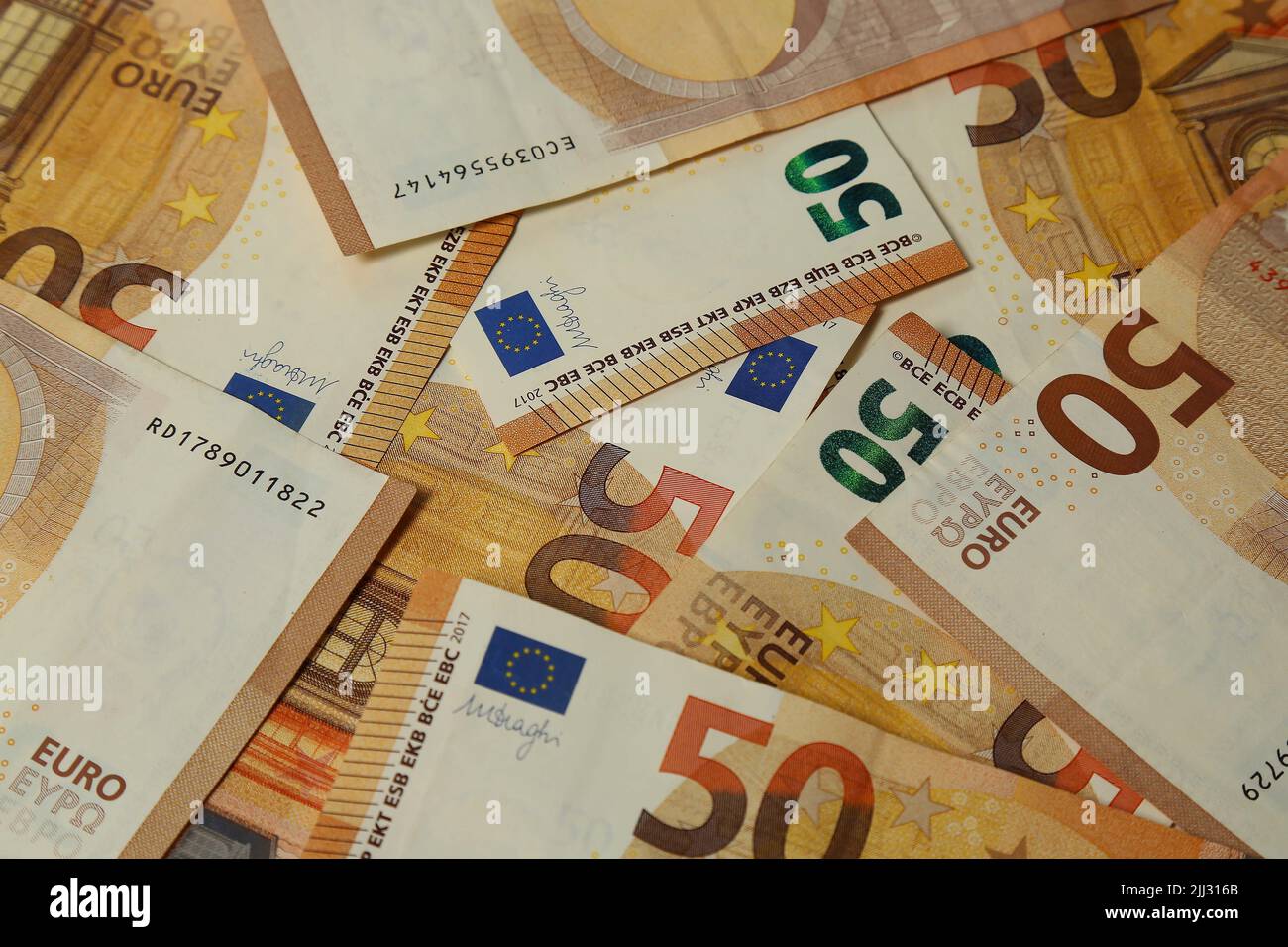 Pile of paper euro banknotes as part of the united country's payment ...