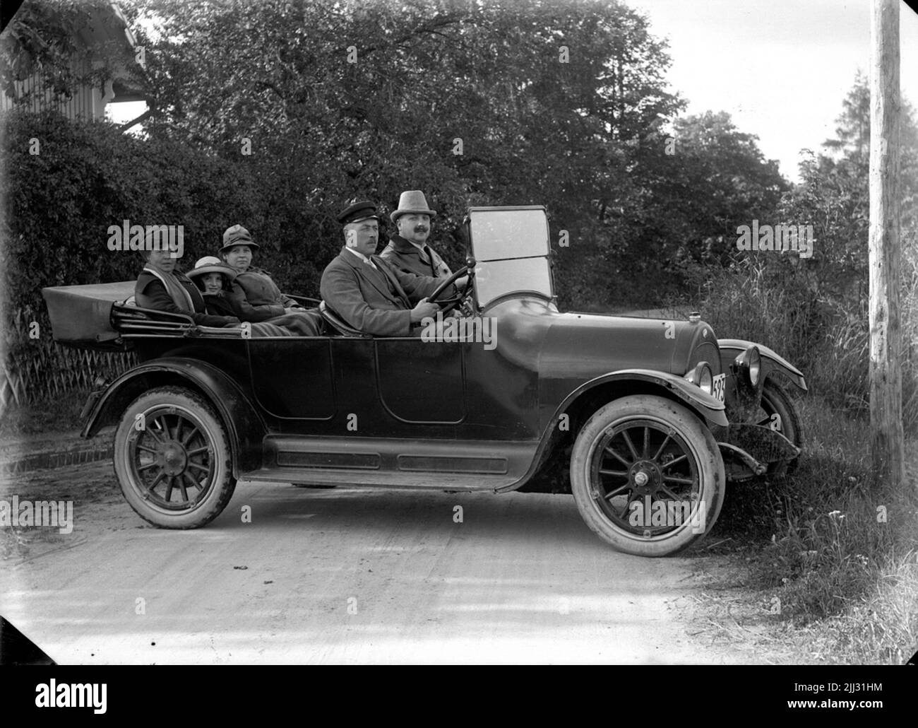Five passenger vehicle Black and White Stock Photos & Images - Alamy