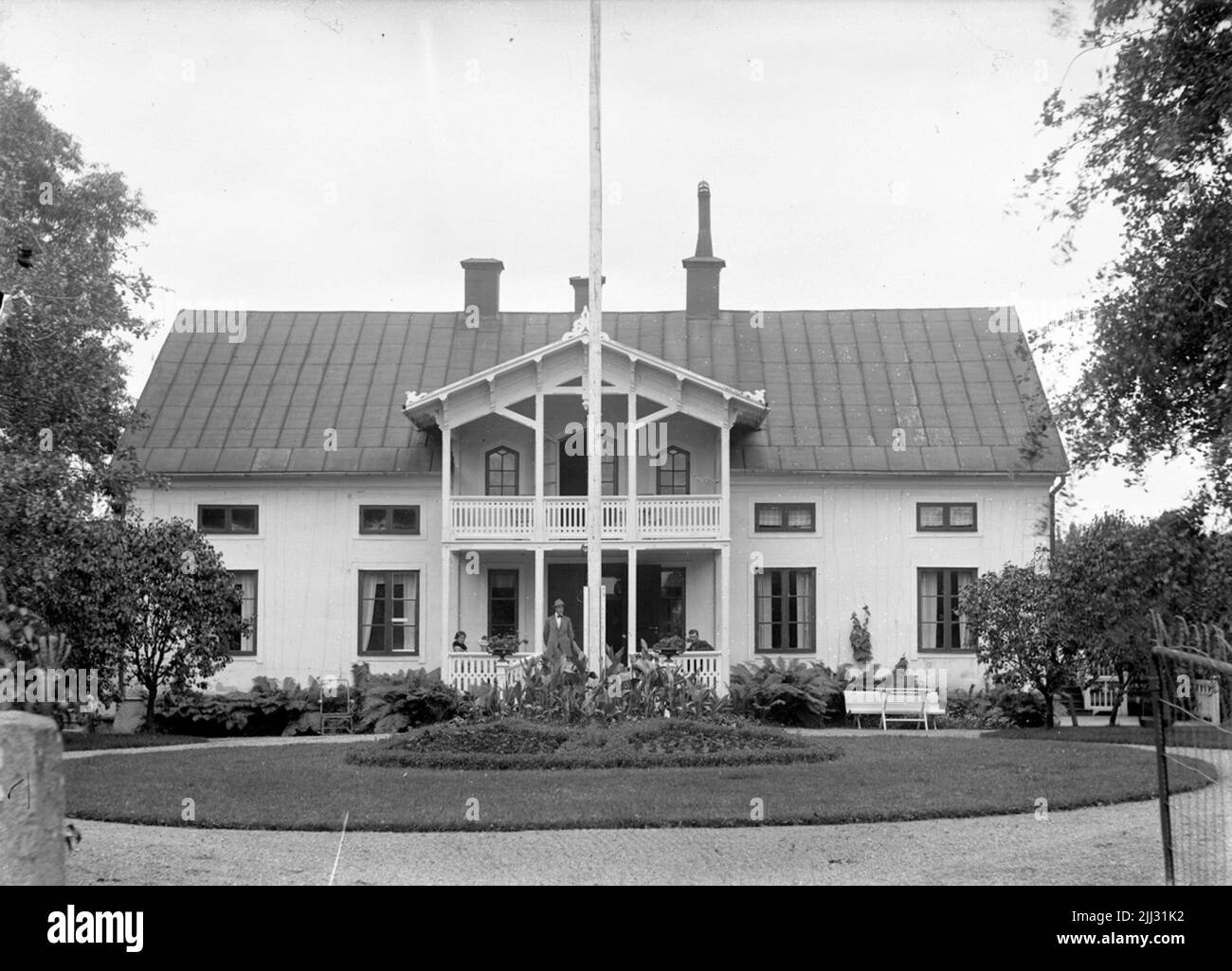 Residential building, family group Three people Stock Photo - Alamy