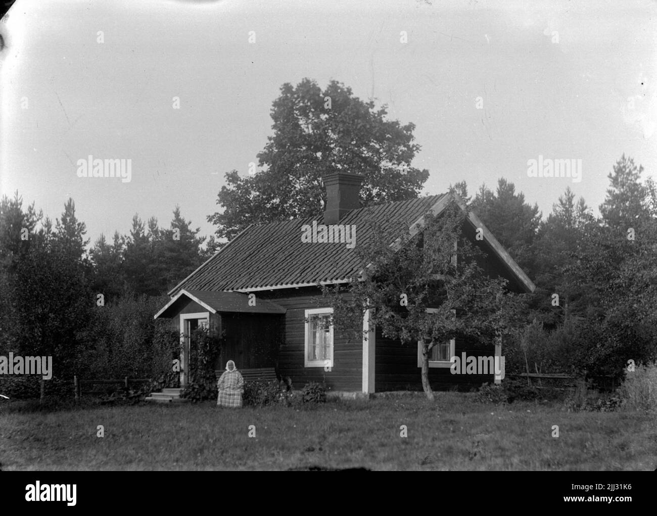 Residential building, a woman Stock Photo - Alamy