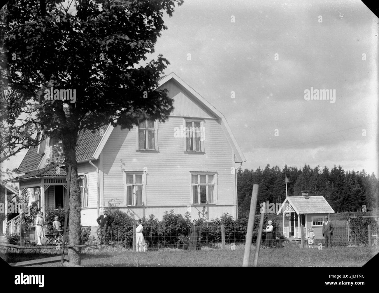 Residential building, group nine people Stock Photo - Alamy