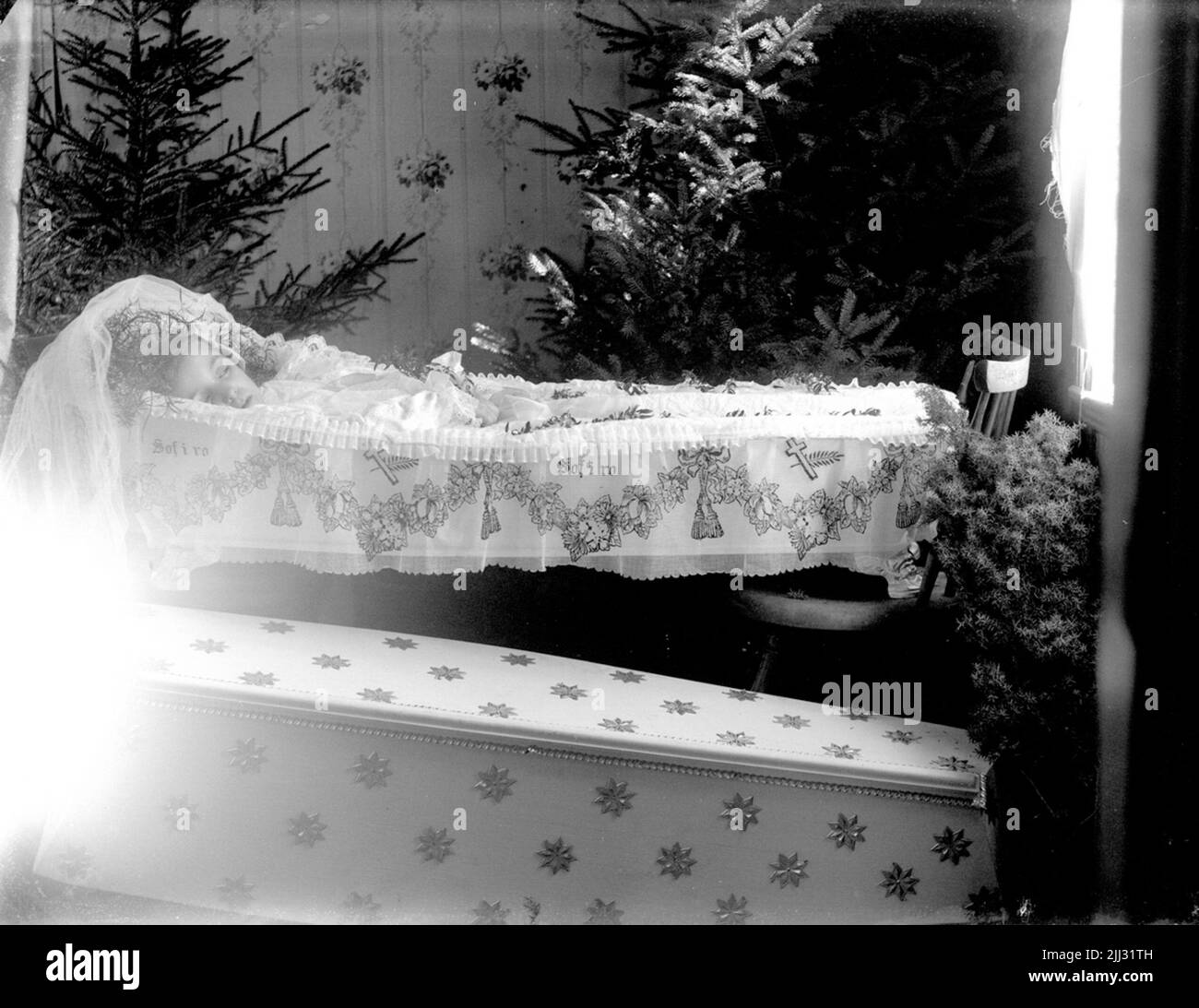 Burial, corpse with a child Stock Photo - Alamy