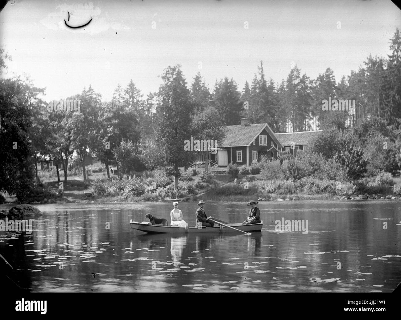 Dog people lake Black and White Stock Photos & Images - Alamy