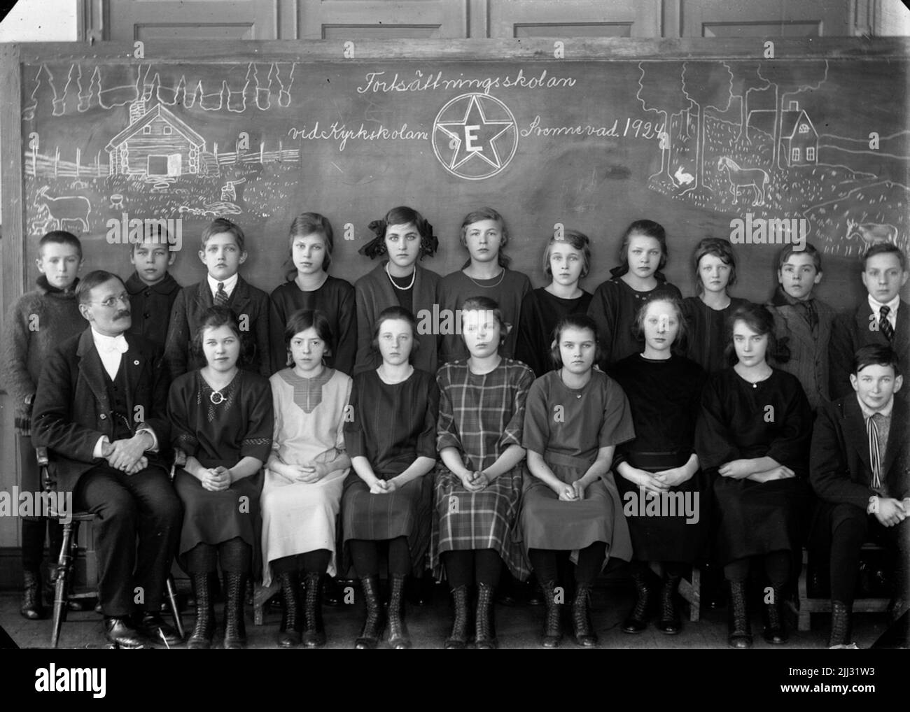 Classroom interior, students with teachers. The continuing school at ...