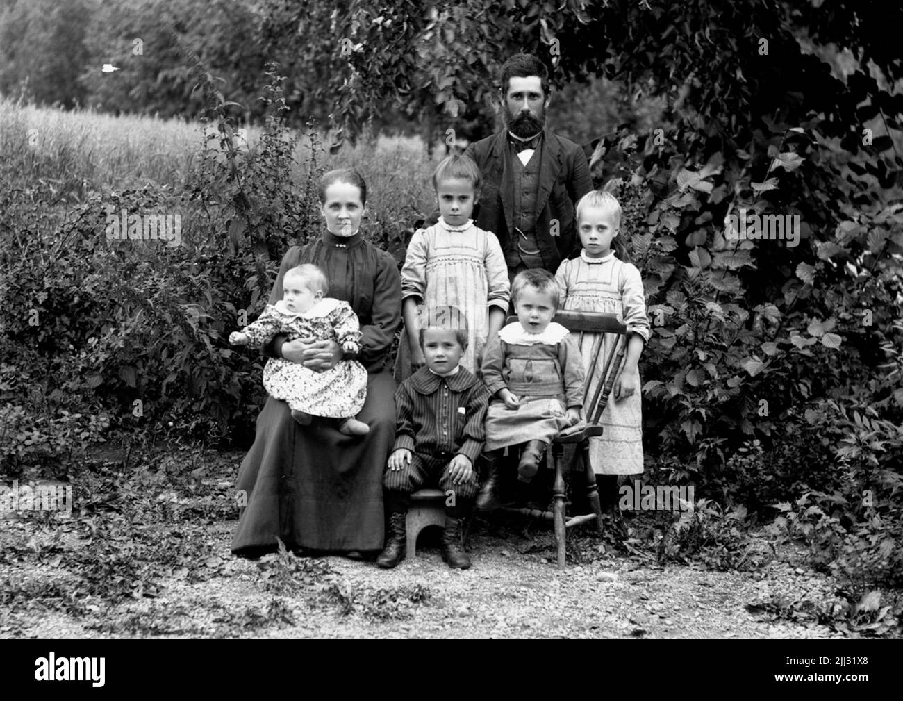 Family group seven people Stock Photo - Alamy