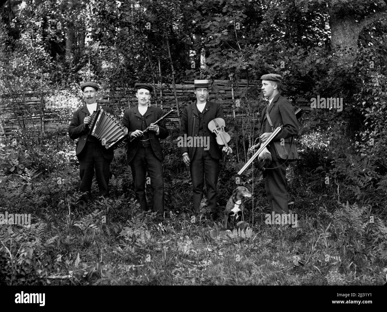 Three men with musical instruments, a hunter with weapons and a dog ...