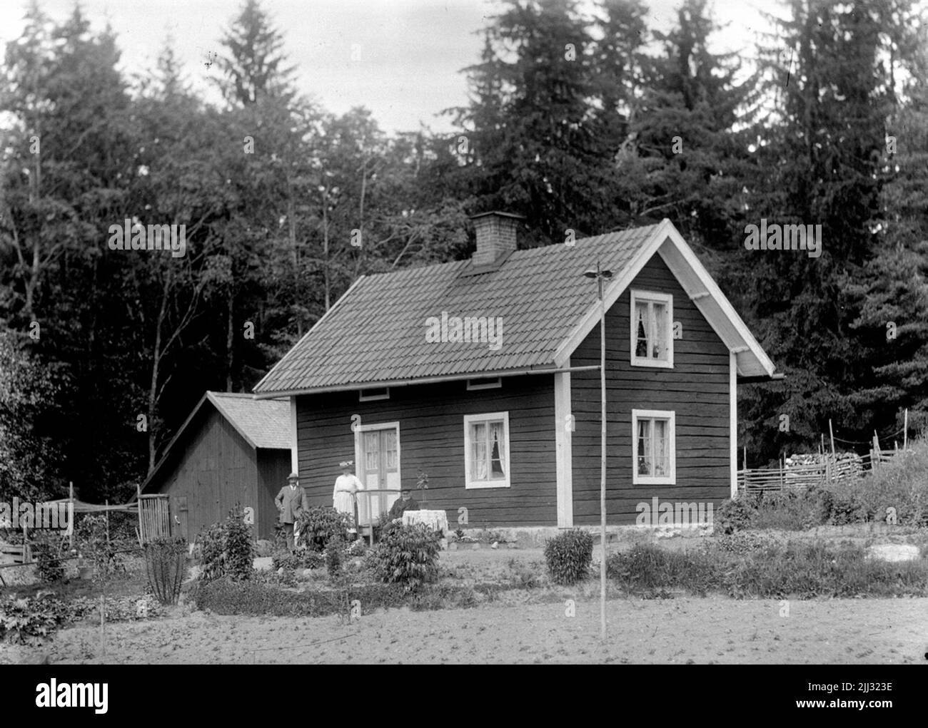 Residential buildings, three people Stock Photo - Alamy