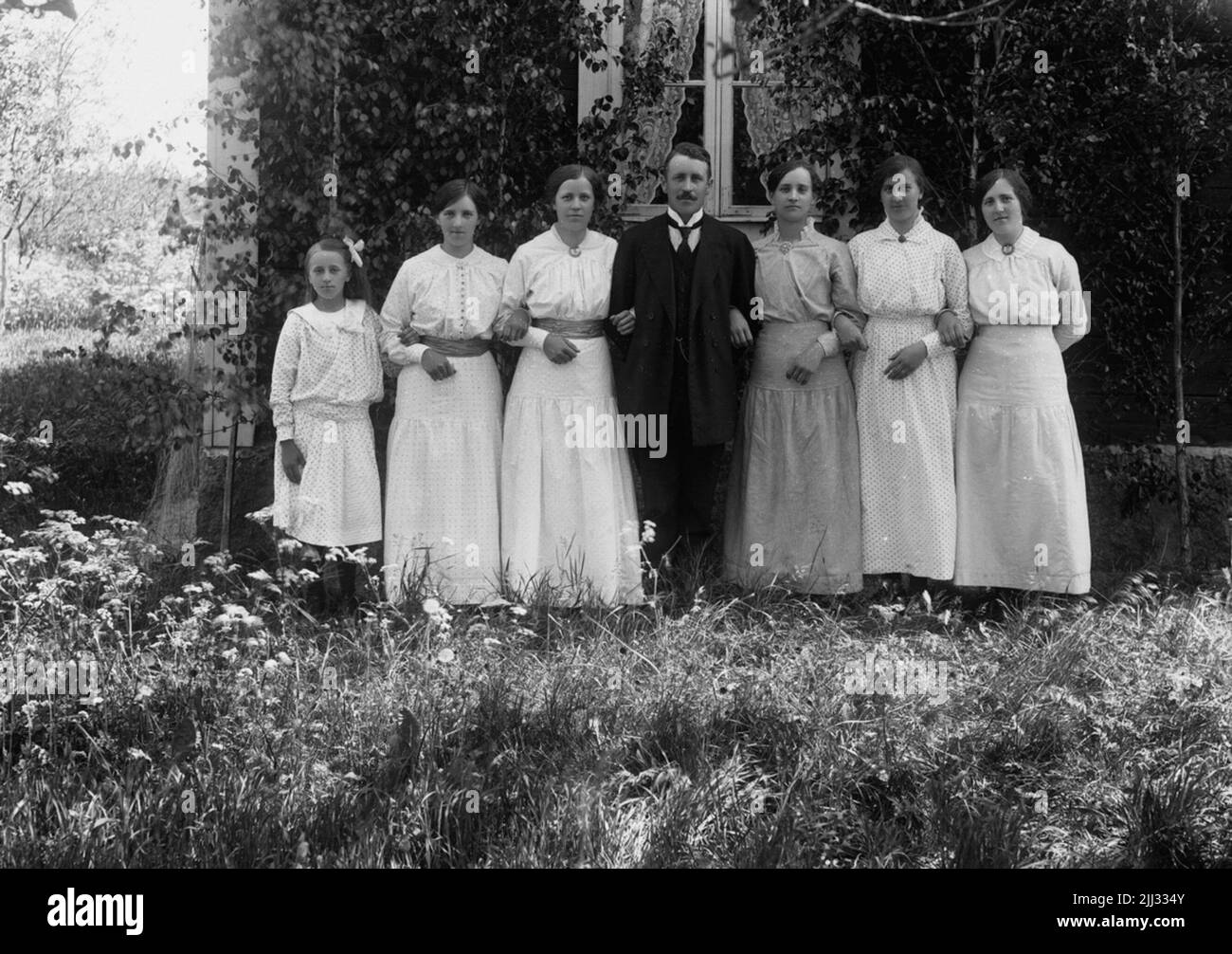 Seven people seated hi-res stock photography and images - Alamy