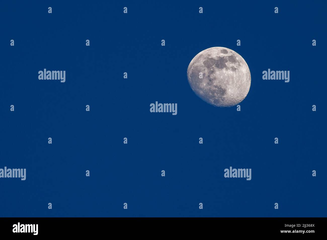 Nearly full moon Stock Photo - Alamy