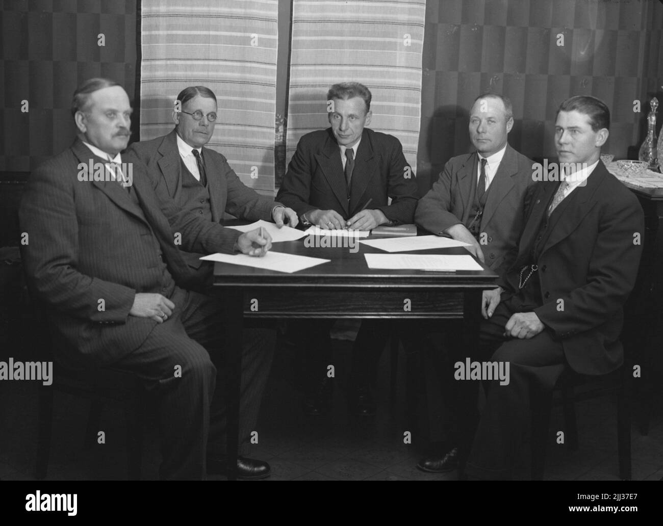 Längbro Egnahem Board, five gentlemen around a table. Chairman Persson ...