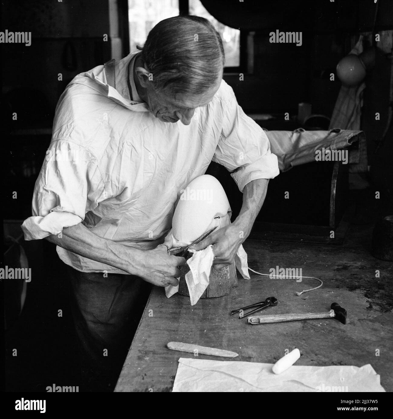 Cut the fabric Black and White Stock Photos & Images - Alamy