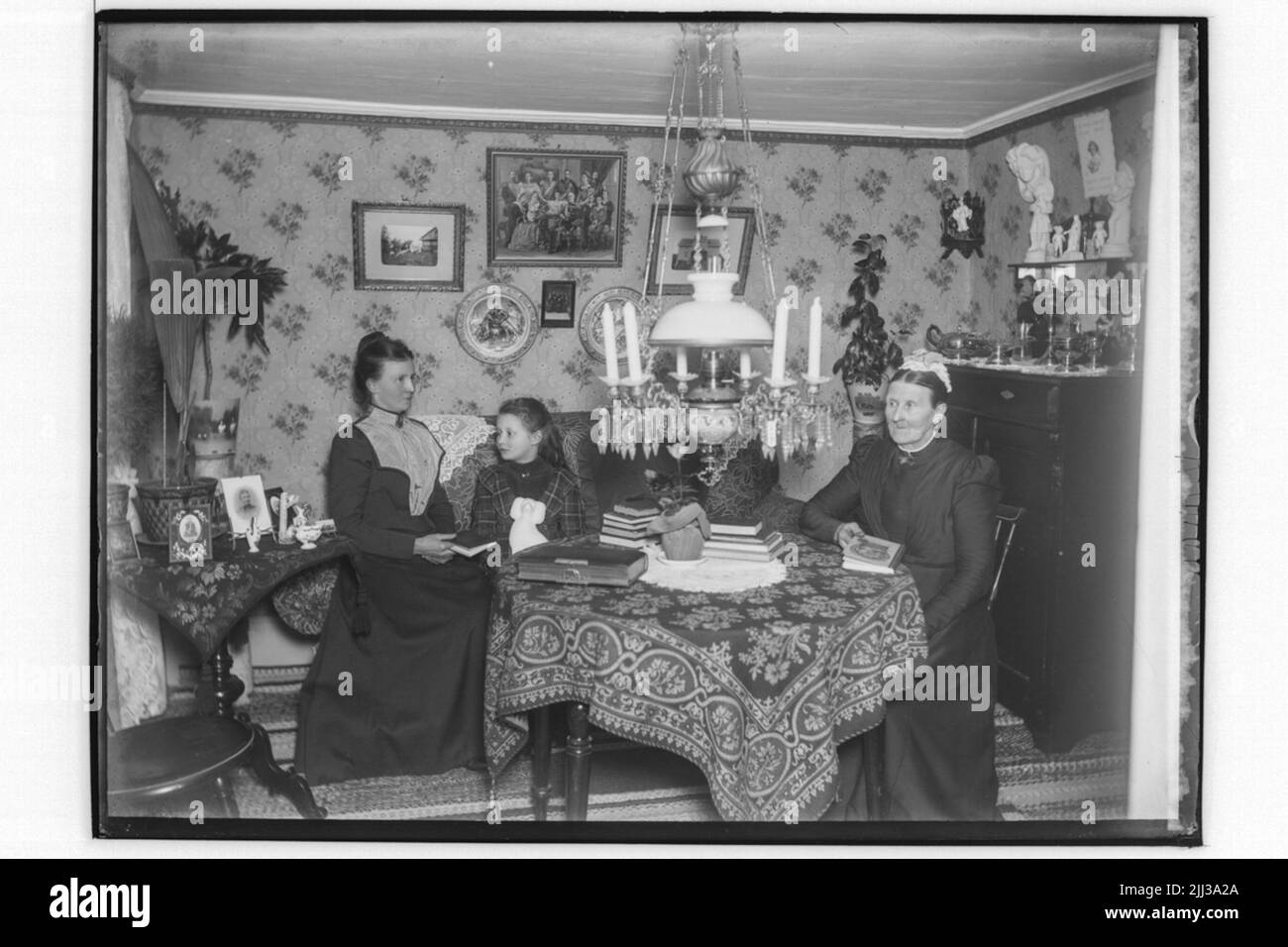 Room interior, 3 people.Berta Larsson Stock Photo - Alamy