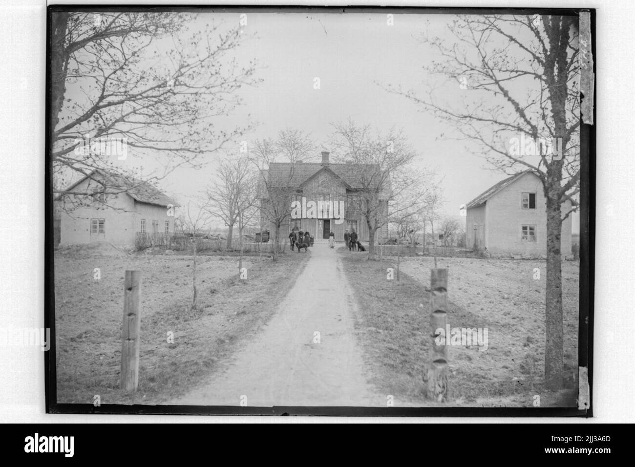 Two -storey residential building with front stove. Two wing buildings ...