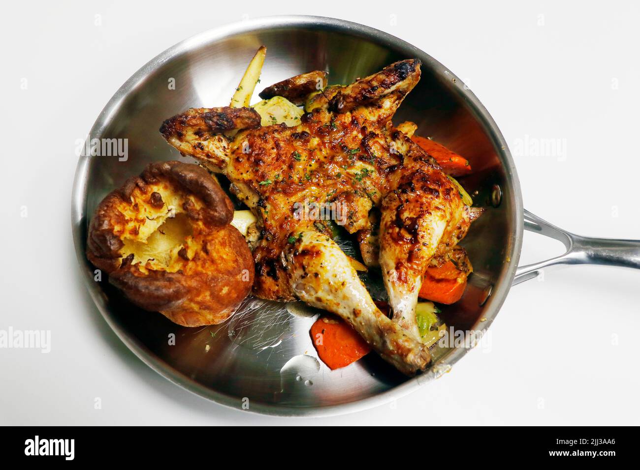 oven roasted or baked marinated baby chicken with vegetables and ...