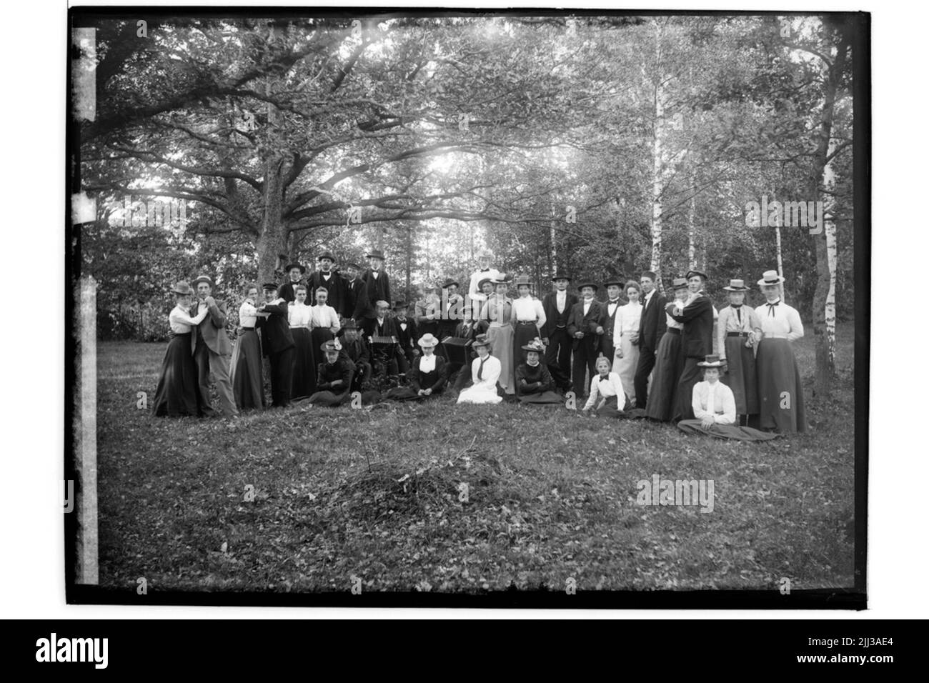 Group, 35 people. Forest guard F. Holmberg Stock Photo - Alamy