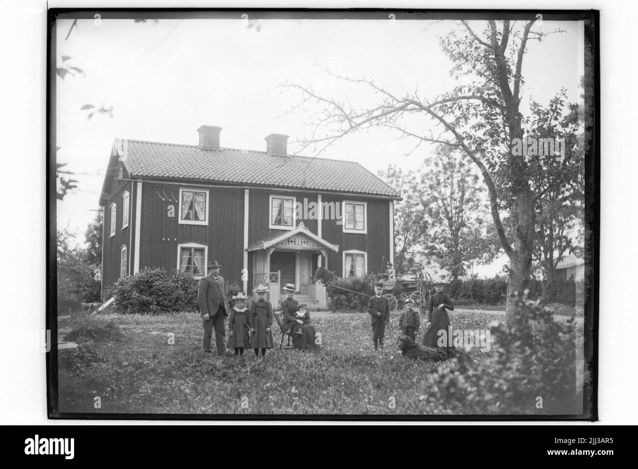 Two -storey manor building, 9 people and a horse shoot. Carlsson Stock ...
