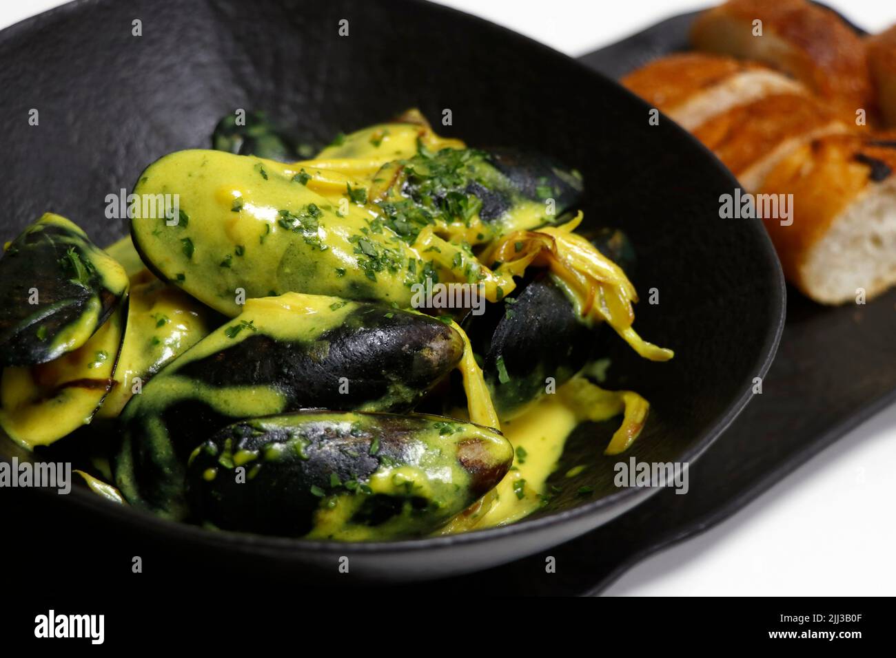 mussels moilee or moily, south indian seafood stew with rich coconut ...